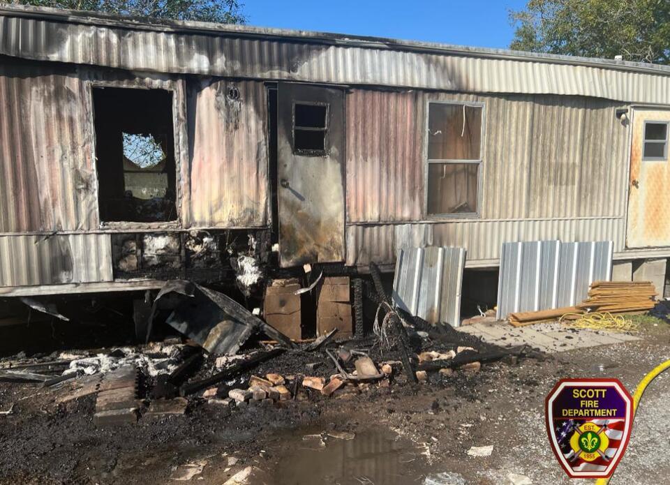 Firefighters respond to Scott house fire that left two injured, dog ...