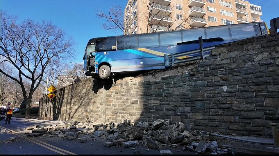 MTA bus dangles off overpass near Henry Hudson Parkway - NewsBreak