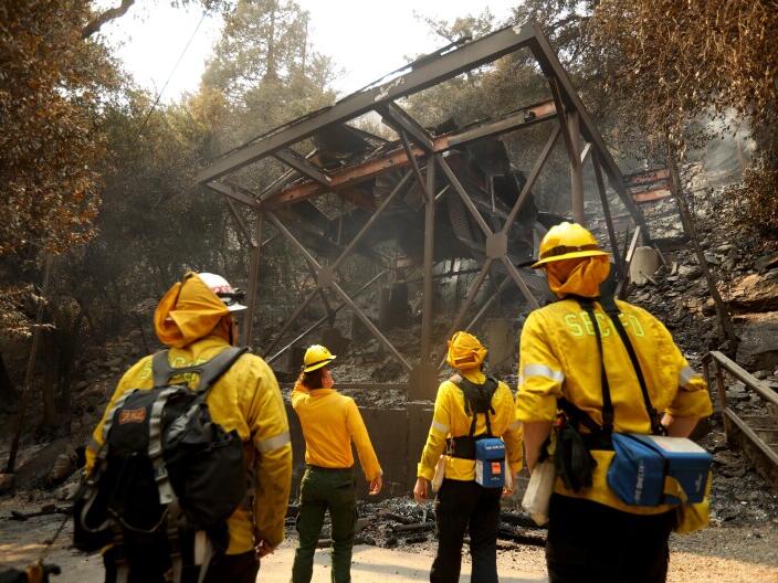Evacuations lifted or downgraded as firefighters make progress on 3 big ...