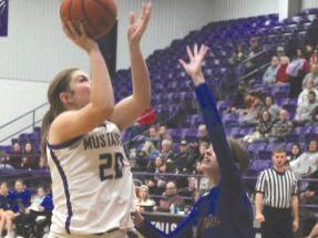 Lady Mustangs basketball team ends regular season with loss