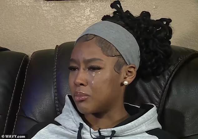 Track star charged with ASSAULT for viral baton bashing incident she ...