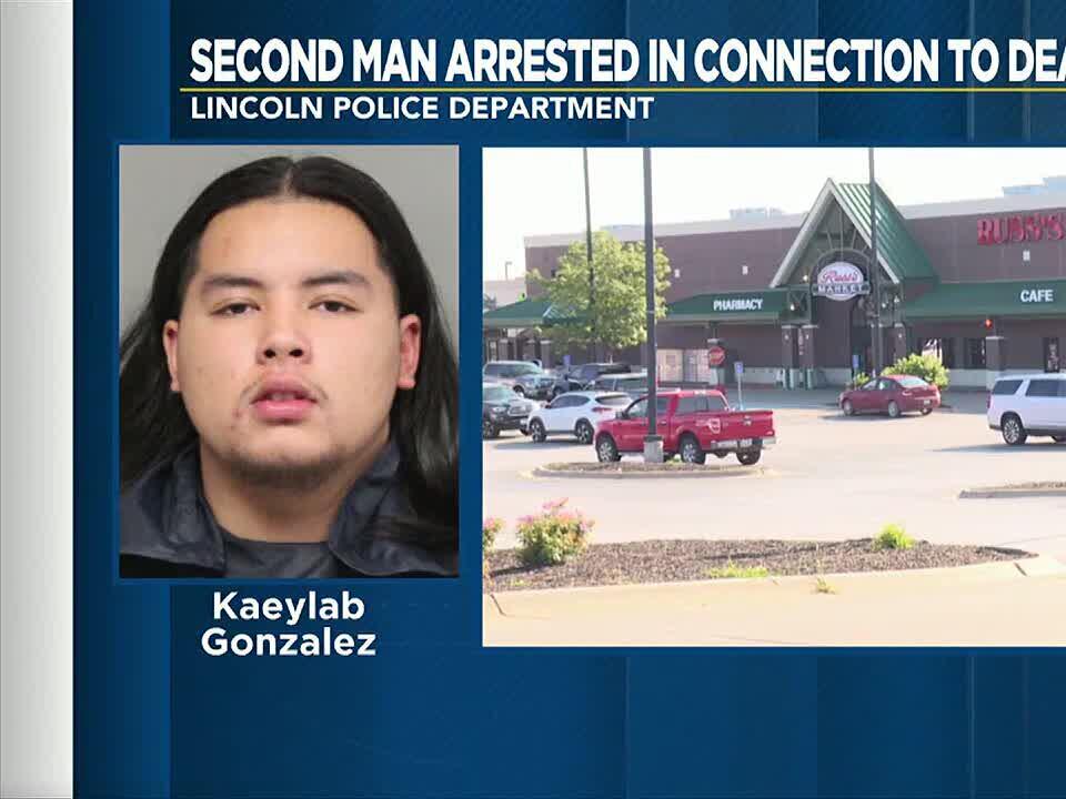 Second man arrested in connection to deadly shooting outside Russ's Market