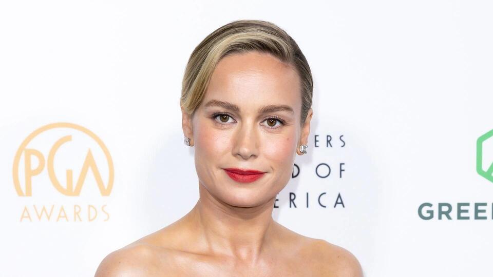 Brie Larson flaunts toned figure in orange bikini during Mexican ...