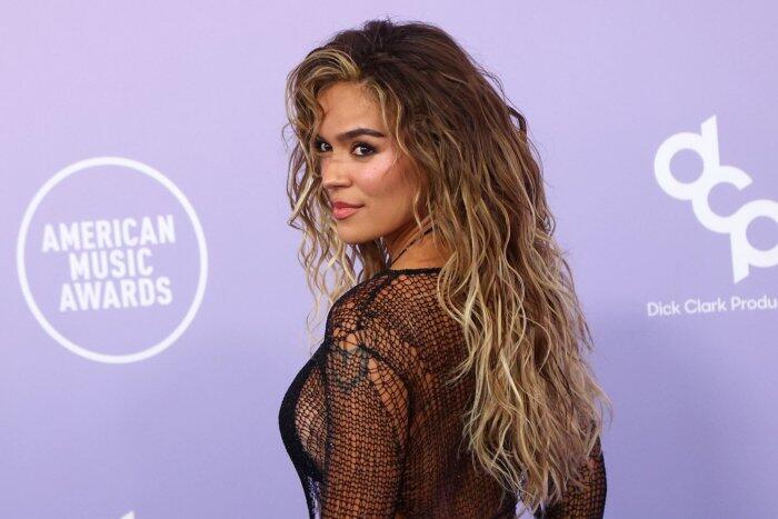 Karol G, Queen Latifah arrive at 2026 American Music Awards - NewsBreak