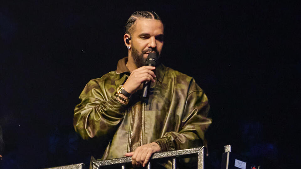 Drake Shuts Down Longstanding Rumor T.I. Associate Urinated on Him ...