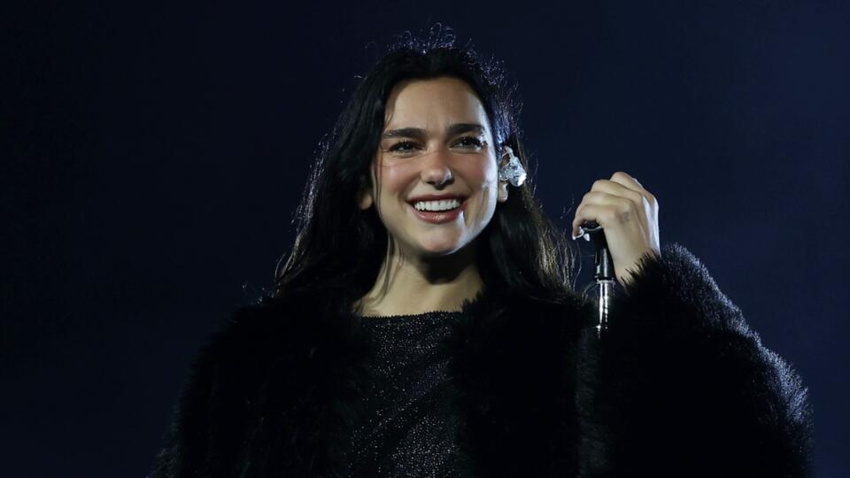 Dua Lipa Models a Sheer Shirt for YSL Shoot - NewsBreak