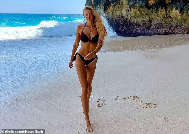 German track star Alicia Schmidt, dubbed 'the world's sexiest athlete', goes public with her ...