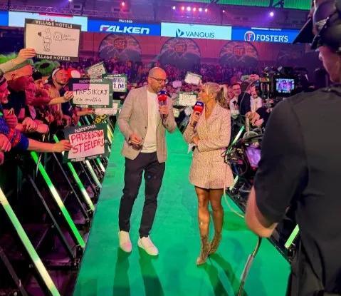 Sky Sports presenter Emma Paton puts on leggy display at World Darts ...