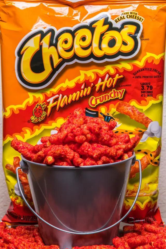 Cheetos & popular snacks to be banned as officials take aim at ...