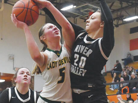 Lady Devils back to defend district title