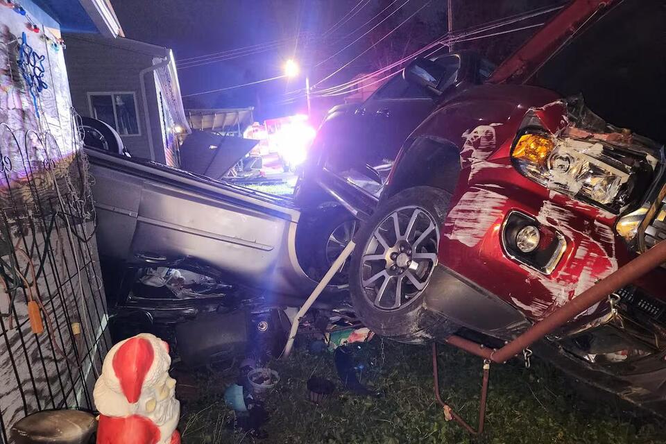 Vehicle crashes into Lead garage, ends up on top of second vehicle ...