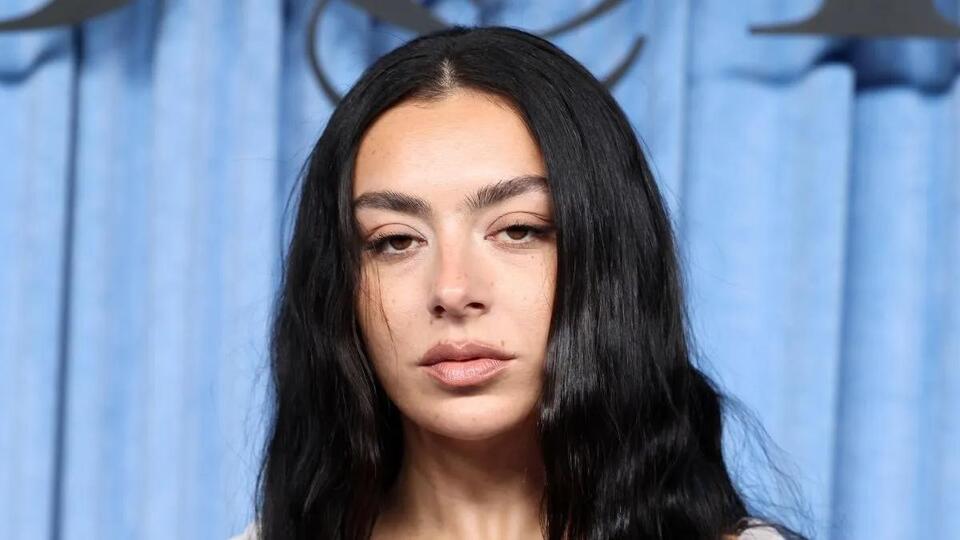 Charli XCX Stuns in Sheer Black Off-Shoulder Outfit, Fans Say ‘Height ...