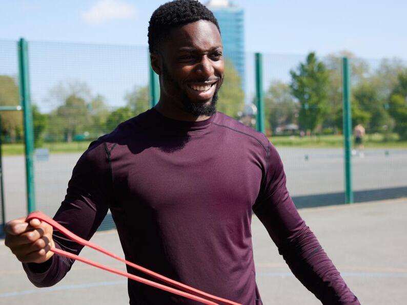 Build full-body strength and boost your metabolism with this trainer's 30-minute resistance band ...