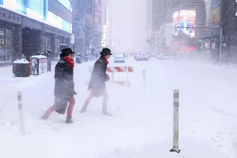 Retired NYPD officer dies while shoveling snow as death toll from ...