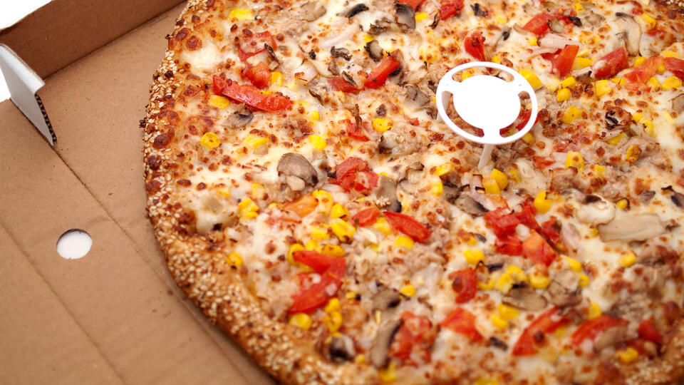 The Pizza Chain That Competes With Your Favorite Fast Food Abroad But ...