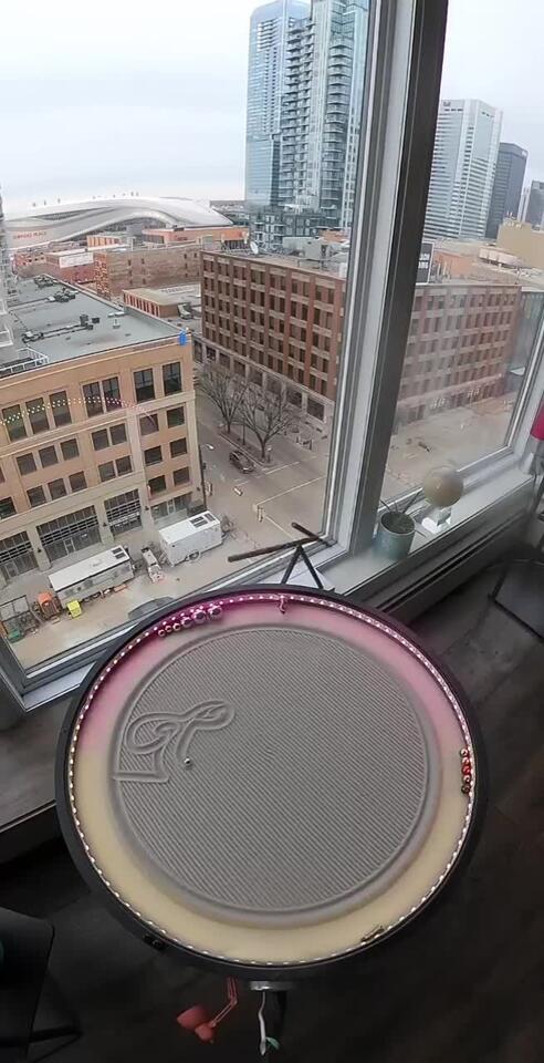 Kinetic sand machine draws the Cheers logo in the sand - NewsBreak