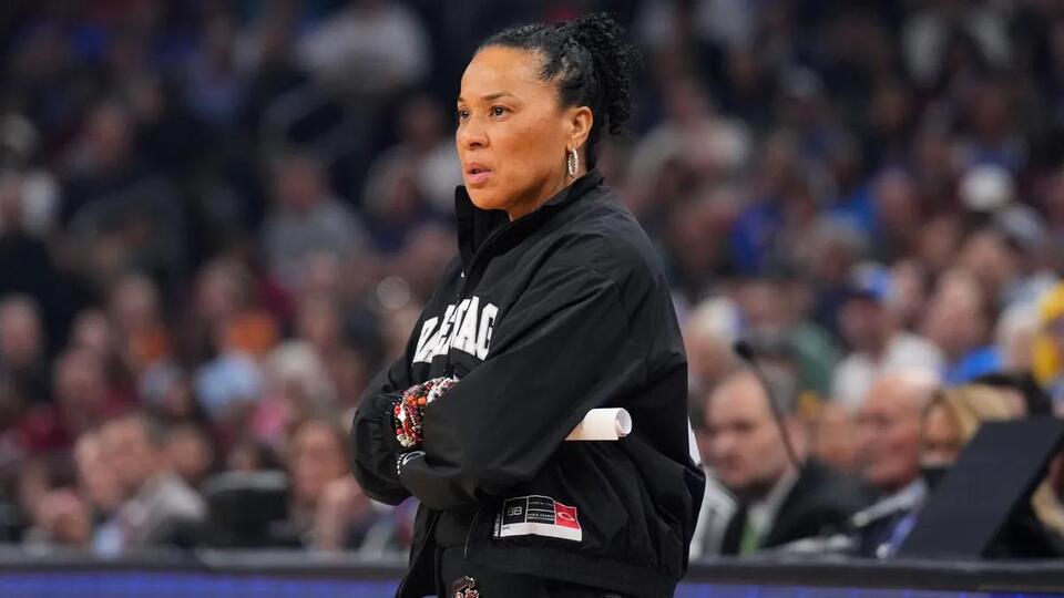 Dawn Staley wearing Balenciaga basketball jacket for South Carolina ...