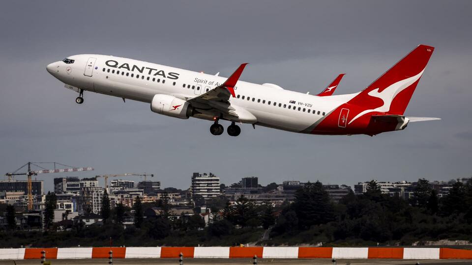 Qantas shares surge to record high as profit jumps on robust travel ...