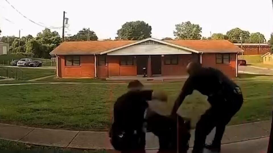 Doorbell camera shows North Carolina officer punching woman during ...