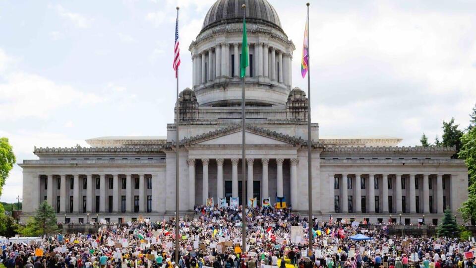 An Estimated 5,000 Gather for ‘No Kings’ Protest at Washington State ...