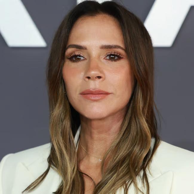Victoria Beckham Steps Out In A Jersey Dress To Receive French ...