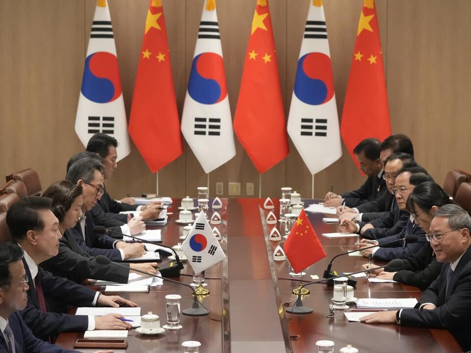 China calls on Japan and South Korea to reject 'protectionism' in ...