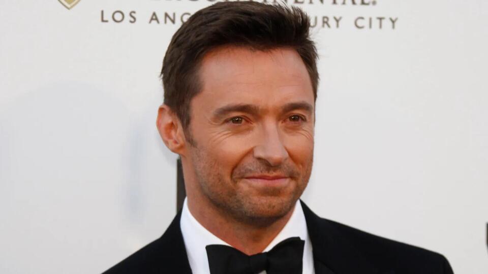 Fans react to Hugh Jackman and Sutton Foster’s stunning red carpet ...