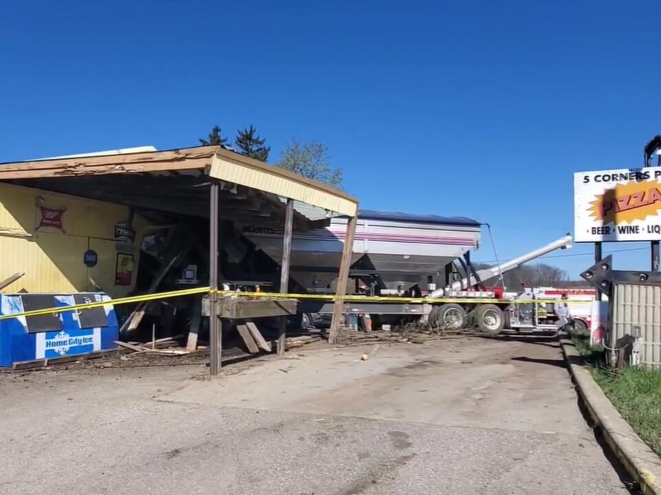 Driver runs stop sign, hits semi truck and sends it into Lakeview party ...