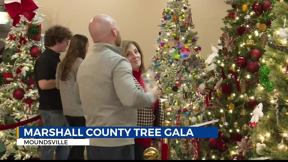 Community support and Christmas spirit filled the room during the ...