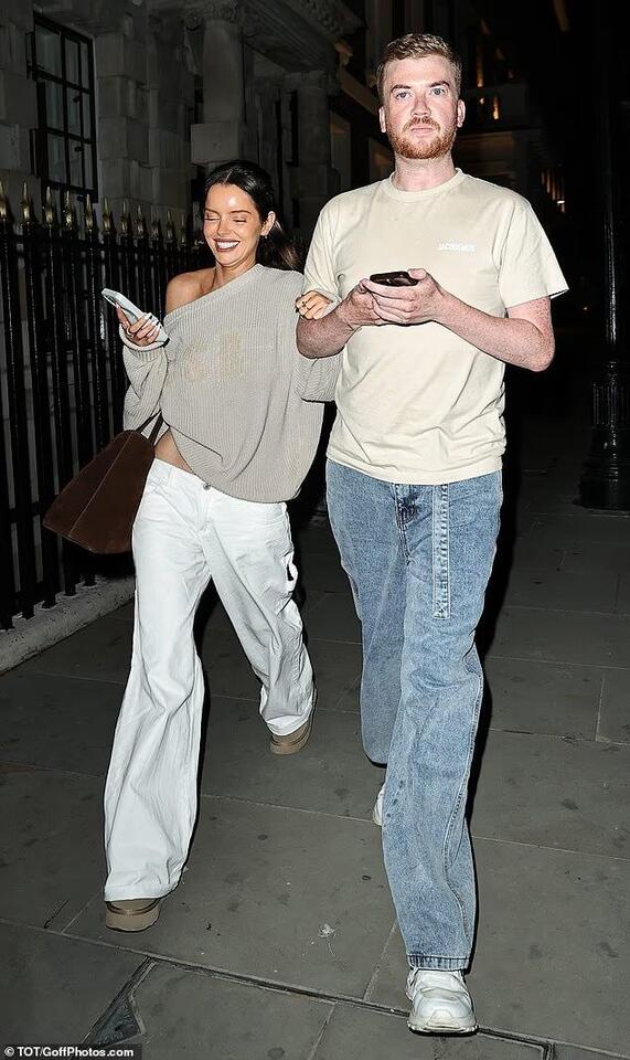 Beaming Maura Higgins enjoys a boozy London night out with her influencer pal Luke Hamnett ...