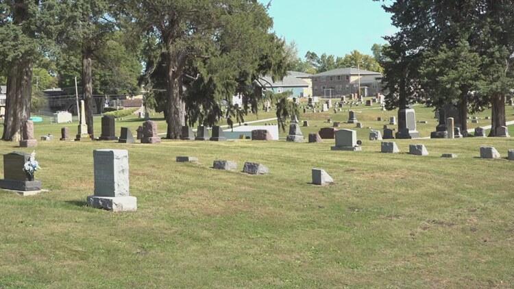 Volunteers work to restore historic gravestones at Glendale Cemetery ...