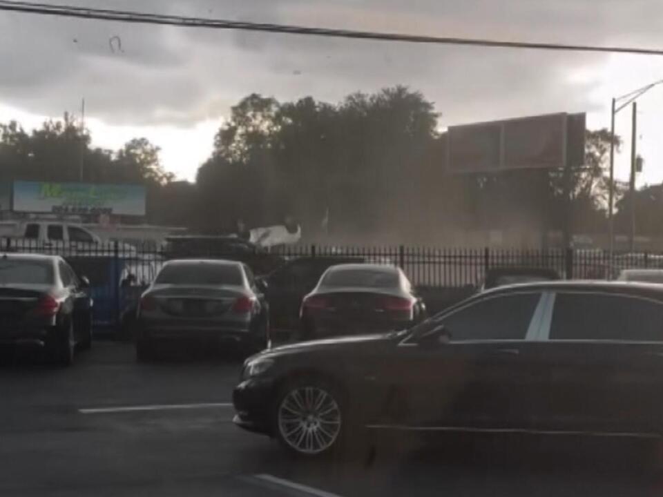 Video shows wind flip over car on busy Jacksonville road
