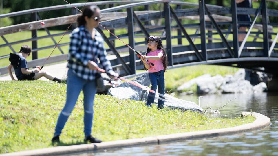 Mothers and children bond during learn-to-fish event - NewsBreak