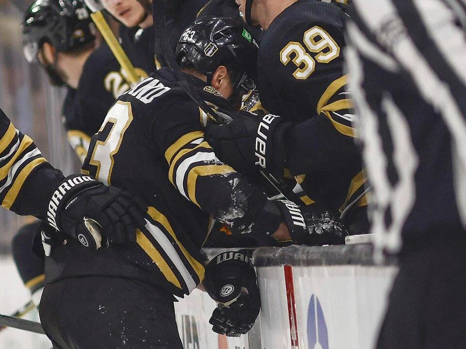 Brad Marchand injury: Bruins captain day-to-day after controversial ...
