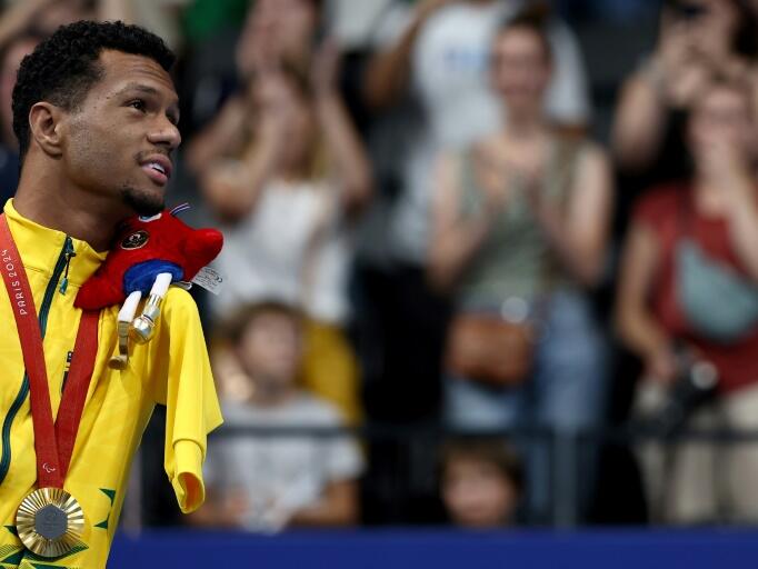 Brazilian swimmer seals golden Paralympic treble, transgender sprinter ...