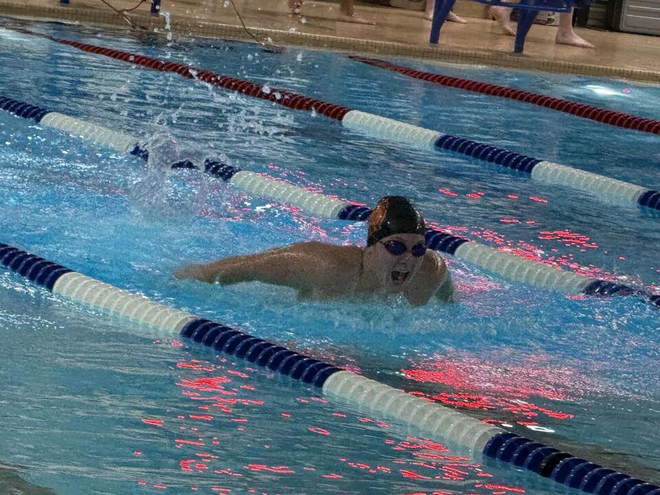 Phillips Wave swimmers place at Merrill - NewsBreak