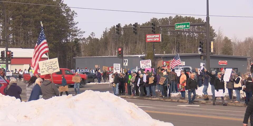 Large protest takes place at Rep. Pete Stauber’s office - NewsBreak
