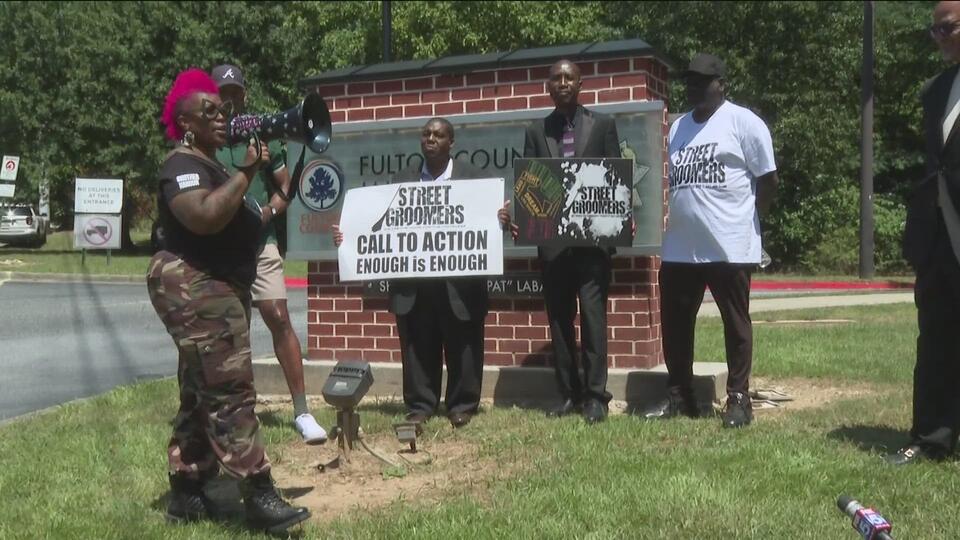 Community members rally, express concerns with Fulton County Jail ...