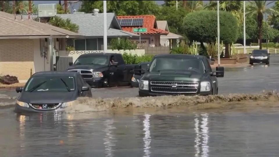 Flood waters across Arizona trap cars, leave families stranded - NewsBreak