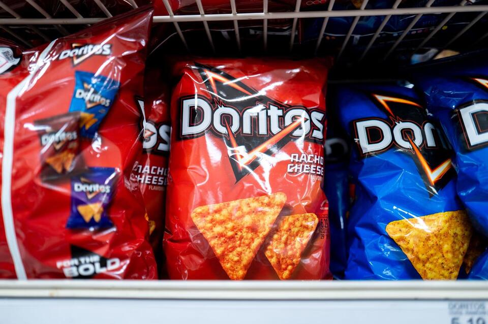 Cheetos and Doritos are turning down the orange color — and yes, it is ...