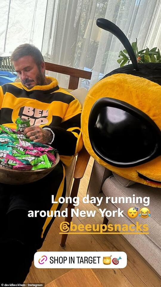 David Beckham gets into the Halloween spirit as he wears a bumblebee ...