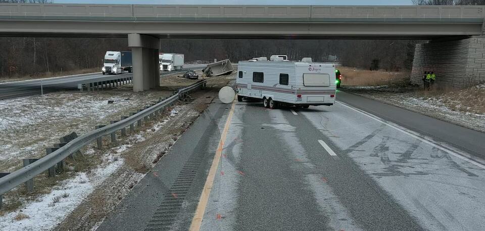 Driver killed in chain-reaction crash with camper, gravel hauler ...