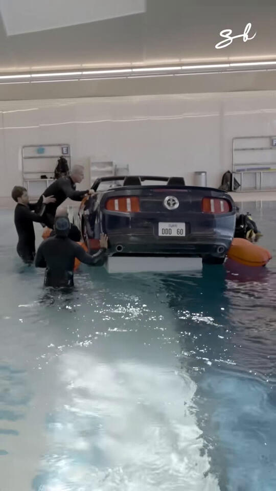 This is how cars are placed into the worlds deepest pool ...